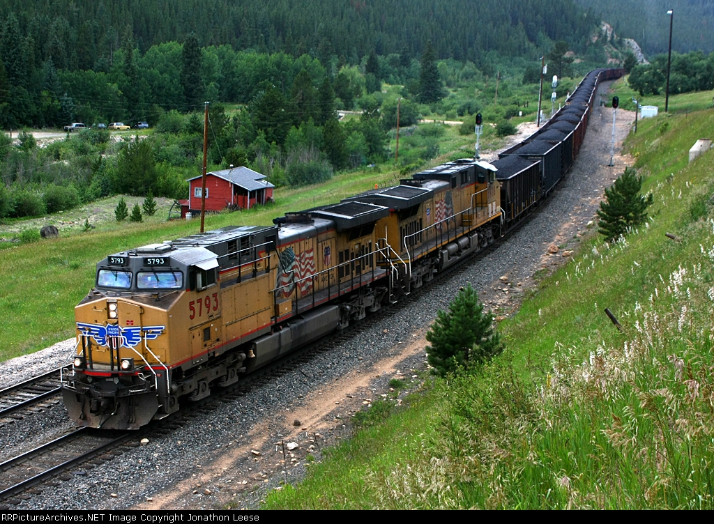 UP 5793 heads down the hill with coal loads